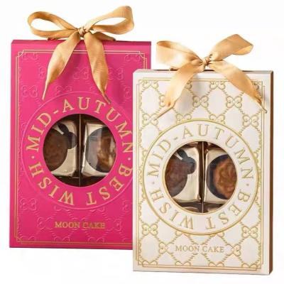 China Golden Color Caoted Paper Foldable Gift Boxes WIth yohuhufuWith Ribbon Window For Mooncake Food Packaging for sale