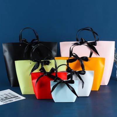 China Reusable 120g 150g 180g Printed Paper Shopping Bag For Grocery for sale