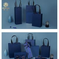 China 2mm Paperboard CMYK Gift Paper Storage Box With Ribbon Handle For Gift Packaging for sale