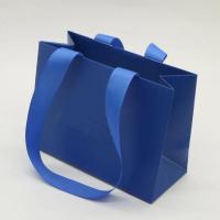 China Multipurpose Flat Handle Paper Bags , Reusable Paper Shopping Bags Blue for sale