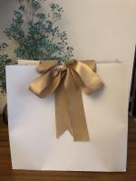 China Customized Color 100g Craft Shopping Paper Bag With Ribbon Handle for sale