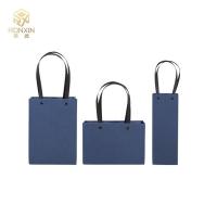 China Foldable 180gsm Kraft Printed Paper Shopping Bag Dark Blue For Gifts for sale