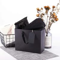 China 120g Fancy Printed Paper Shopping Bag 7'' pure black With Ribbon for sale