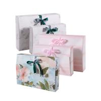 China Recyclable Foldable Gift Boxes With Ribbon Clothing Packaging for sale