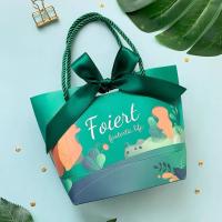 China Green Art Paper Printed Paper Shopping Bag With Ribbon Handle Rope For Gift Package for sale