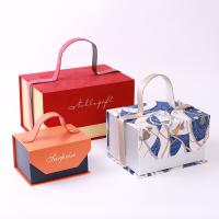 China Red Special Paper paperboard gift boxes with leather handle for gift wedding party package for sale