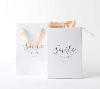 China Cosmetic Package Coated Paper Foldable Box With Ribbon Hot Stamping for sale