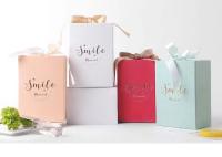 China Cosmetic Package Coated Paper Foldable Box With Ribbon Hot Stamping for sale