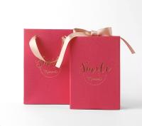 China Cosmetic Package Coated Paper Foldable Box With Ribbon Hot Stamping for sale