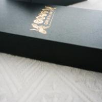 China Black Art Paper Paperboard Gift Boxes With Foil Hot Stamping Logo For Gift Packaging for sale