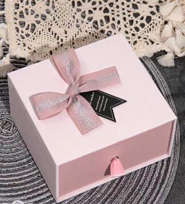 China Art Paper Pink Paperboard Gift Boxes With Ribbon Drawer Box Shape For Cosmetic Packaging for sale