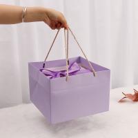 China Red Art Paper Kraft Gift Box With Window Rope Handle For Perfume Packaging for sale