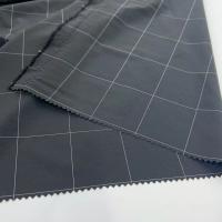China Four Way Stretch Plaid Jacquard Textured Fabric 91% Nylon 1% Polyester 8% Spandex for sale