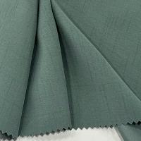 China 98% Polyester 2% Spandex Cationic Polyester Fabric 137GSM Dyed Bamboo Slub Weft Elastic Twill for sale