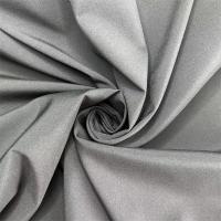 China Raised Dot Sustainable Recycled Fabric 145GSM Dobby Polyester Spandex Fabric for sale