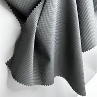 China 75D Low Elasticity T400 Hollow Grid Fabric 100% Recycled Polyester Perforated Grid Pattern for sale