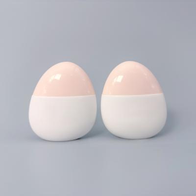 China 50ml Capacity PE Mini Sunscreen Bottle Egg Round Packaging Solution Suitable for Sunscreen and Lotion Products for sale