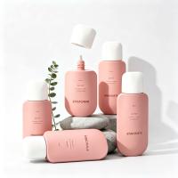 China Flat Unique 30ml Capacity Round Shape Sunscreen Bottle with Customized Printing for Cosmetic Use for sale