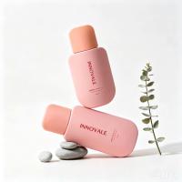 China Flat Unique 30ml Capacity Round Shape Sunscreen Bottle with Customized Printing for Cosmetic Use for sale