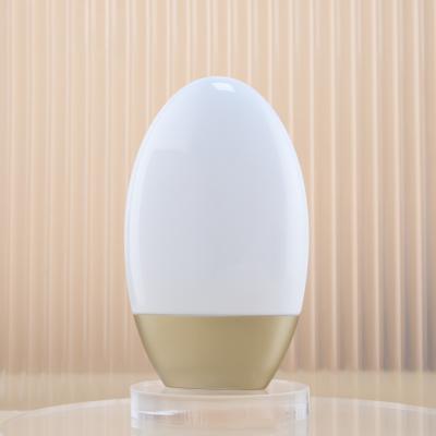 China Oval 30ml 50ml PE Plastic Sunscreen Bottle Round Design Practical Packaging Solution for Sunscreen and Cosmetic Products for sale