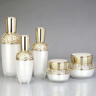 China SAN Material Gold Luxury Crystal Airless Bottle Featuring Durable PP and ABS Pump Ideal for Cosmetic Packaging Solutions for sale