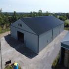 China Q235B Steel Texture Steel Structure Warehouse with Long Fatigue Life and Optional Lighting System for sale