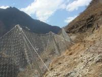 China Galvanized 4mm Wire 10*5m Round Mesh Rockfall Barrier Net for sale