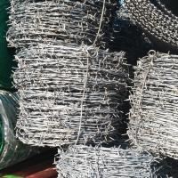 China 25kg Galvanized Iron Barbed Wire Razor Wire Roll 2.5mm Diameter for sale