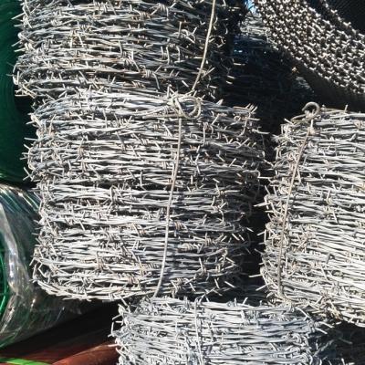 China 25kg Galvanized Iron Barbed Wire Razor Wire Roll 2.5mm Diameter for sale