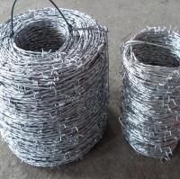 China 25kg Galvanized Iron Barbed Wire Razor Wire Roll 2.5mm Diameter for sale