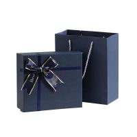 China Orange Cosmetic Paper Box Makeup Sets Ribbon Cosmetic Packaging Box for sale