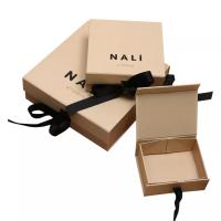 China Collapsible Jewelry Packaging Boxes Magnetic Jewelry Paper Box With Black Ribbon for sale
