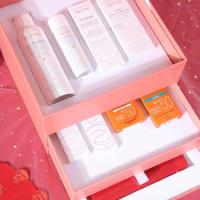 China Cosmetic Skincare Packaging with Pop Out Sections for Bottles and Velvet Covered Molded Platforms in Matte Lamination for sale