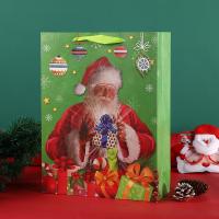 China Christmas Paper Bag Santa Claus Paper Carrier Bags With Silk Handle for sale