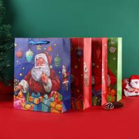 China Christmas Paper Bag Santa Claus Paper Carrier Bags With Silk Handle for sale