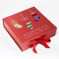 China Luxury Cosmetic Skincare Packaging Red Christmas Gift Box With Magnetic Fastening Flap for sale