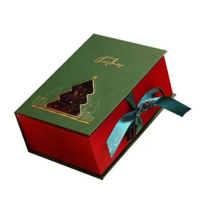 China Recycled Flap Shape Merry Christmas Boxes With Satin Handle for sale