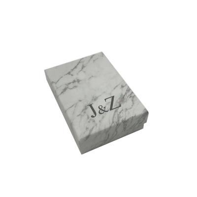 China Luxury Cardboard White Marble Lid Rigid Cosmetic Box Packaging With Foam for sale