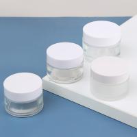 China Glossy Matte Round Shaped Cosmetic Glass Cream Jars With Lid 5g 10g 15g for sale