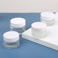 China Glossy Matte Round Shaped Cosmetic Glass Cream Jars With Lid 5g 10g 15g for sale