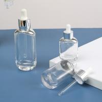 China Oval Glass Empty Dropper Bottles Clear Skin Care Essential Oil Customized Logo for sale