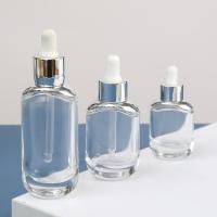 China Oval Glass Empty Dropper Bottles Clear Skin Care Essential Oil Customized Logo for sale