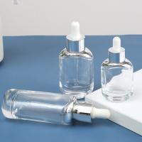 China Oval Glass Empty Dropper Bottles Clear Skin Care Essential Oil Customized Logo for sale