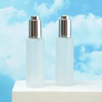 China 30ml Custom Clear frosted glass bottle With Pressure Dropper Cosmetic Skincare for sale