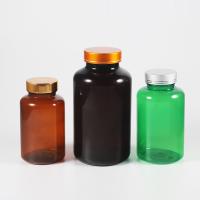 China Highly Customized Luxury Black Frost Pill Bottle Capsule Bottle Green Plastic Vitamin Medicine Bottle Personal Care Packaging With Screw Cap for sale