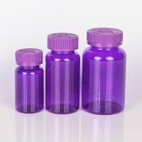 China Highly Customized 4oz PET Capsule Bottle of Orange Black Plastic Nutrition Supplement with Purple Tamper Proof Packaging for sale