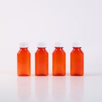 China 2oz 4oz 8oz 12oz16oz Oval Bottle PET Amber Container Cough Syrup Bottle Medicine Liquid Oral Plastic Bottles with Childproof Cap for sale