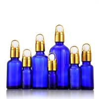 China Frosted Blue Glass Cosmetic Face Serum Bottles Custom Empty Luxury Hair Essential Oil Dropper Bottle with Box Sample Free for sale