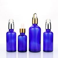 China Frosted Blue Glass Cosmetic Face Serum Bottles Custom Empty Luxury Hair Essential Oil Dropper Bottle with Box Sample Free for sale