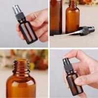 China Stock Amber Glass Spray Bottle 10ml 15ml 20ml 30ml 50ml 100ml Round Glass Empty Perfume Bottle Black Cap Cylinder Bottle Perfume for sale